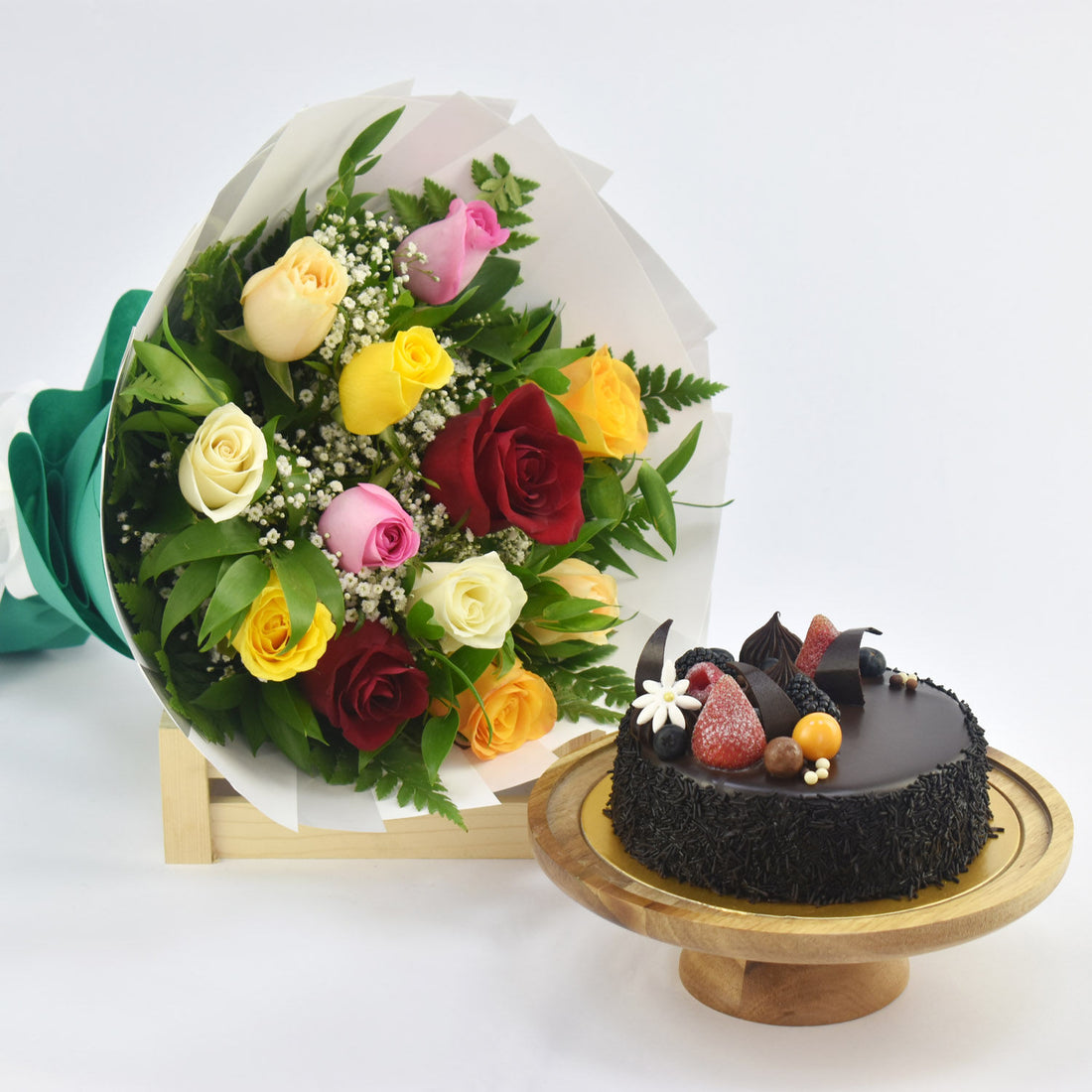 Online Dozen Multi Roses with Fudge Cake Gift Delivery in Qatar - FNP QA
